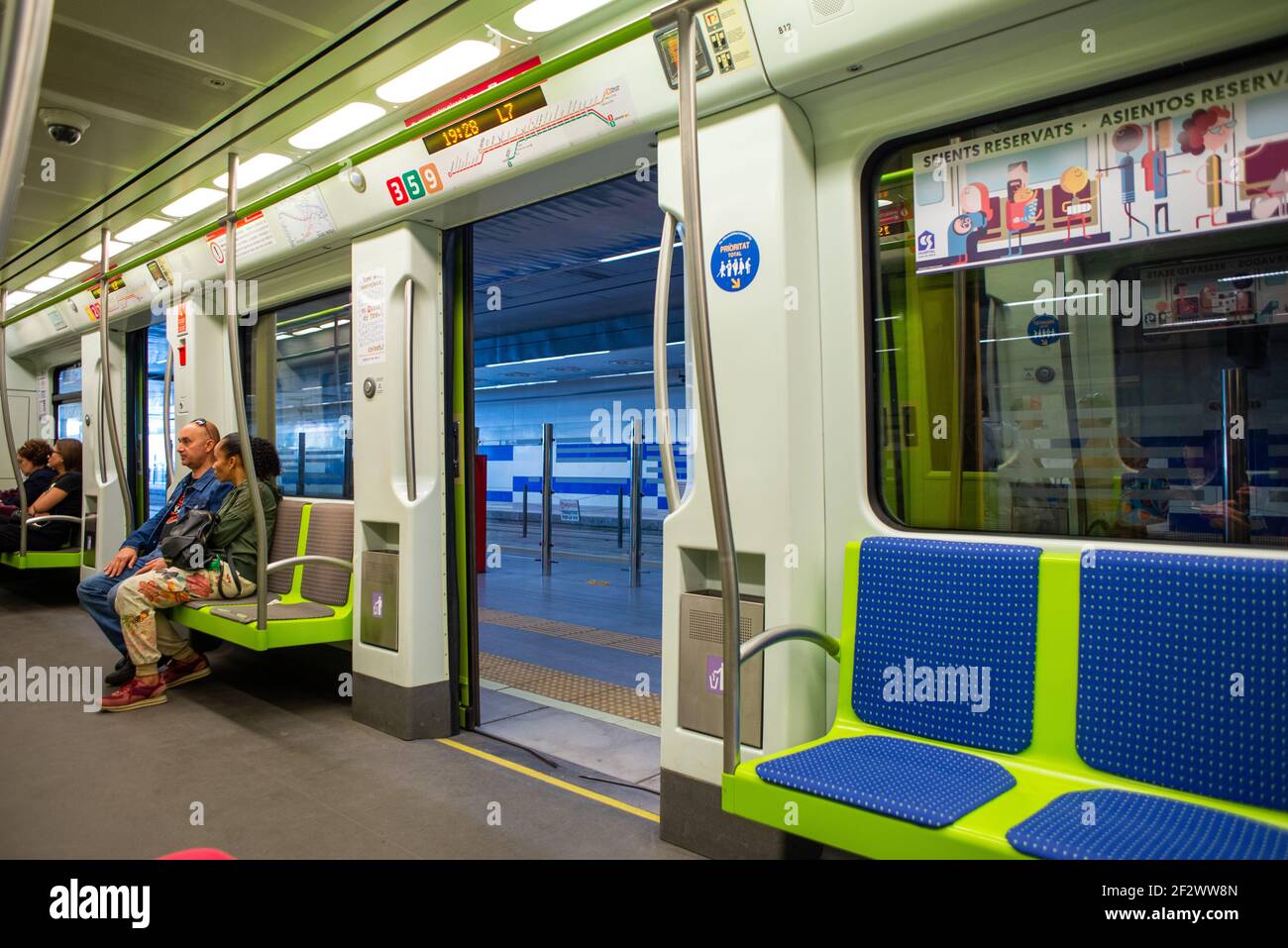 Few people sitting on a wagon of Valencia underground train ...
