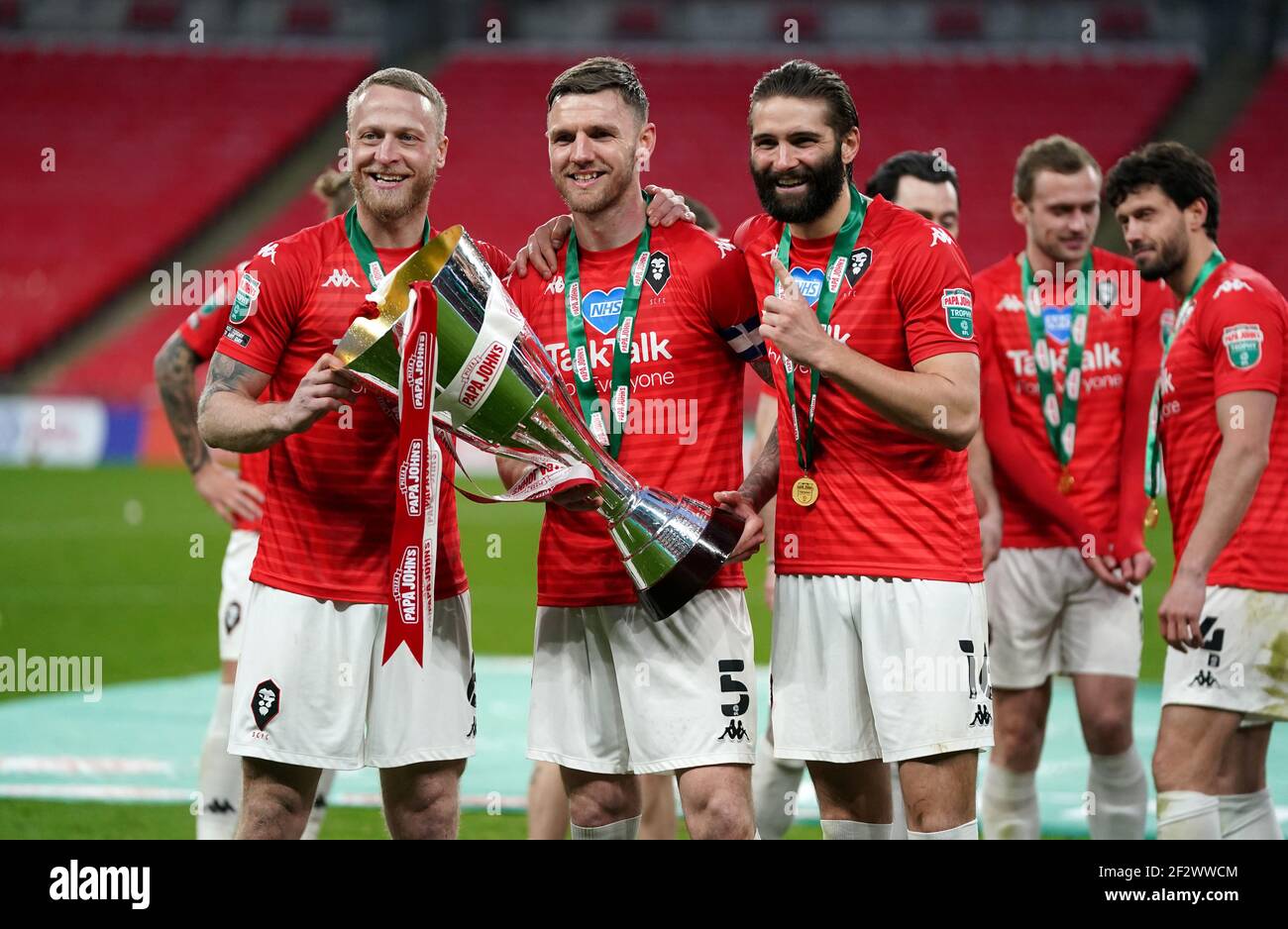 (left to right) Salford City's Tom Clarke, Ashley Eastham and Jordan ...
