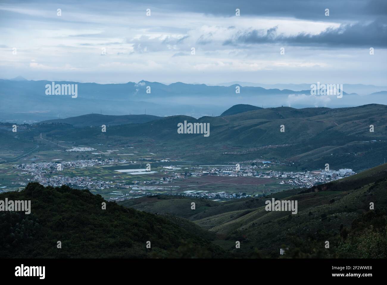 aerial view of agricultural plots of land under cultivation in an ...