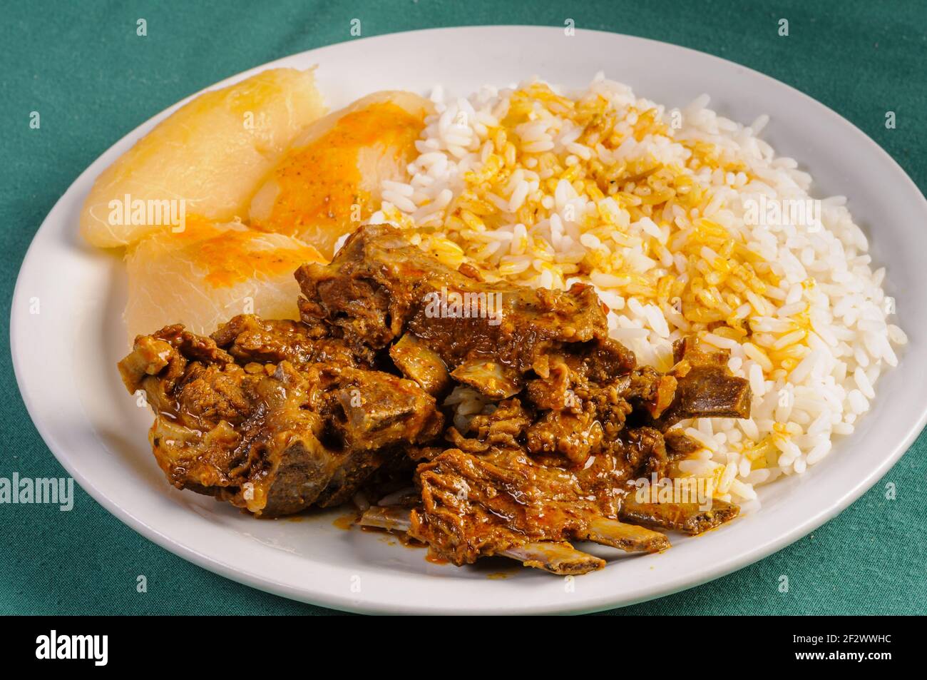 Goat rib with rice and manioc. Popular cuisine from northeastern Brazil ...