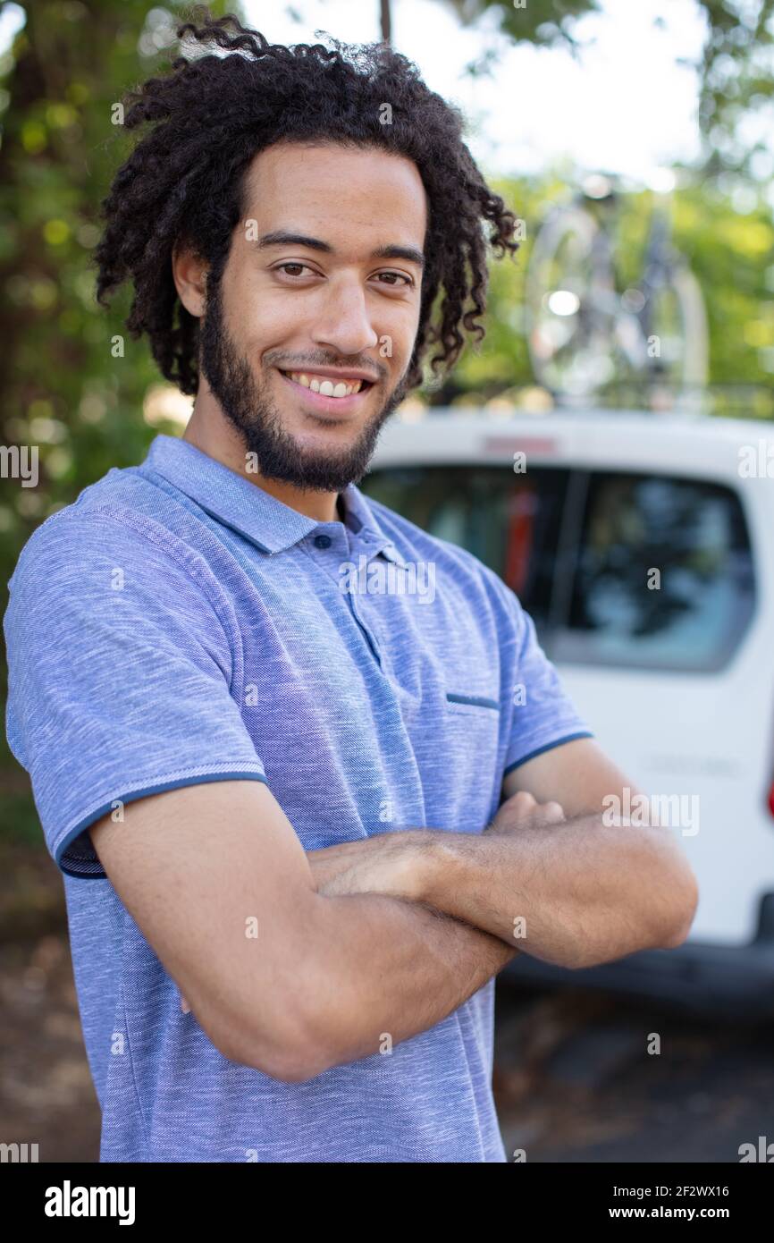handsome man standing in front of car Stock Photo - Alamy