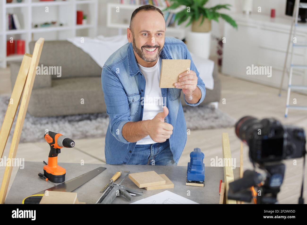 Aged man vlogger recording video hi-res stock photography and images ...