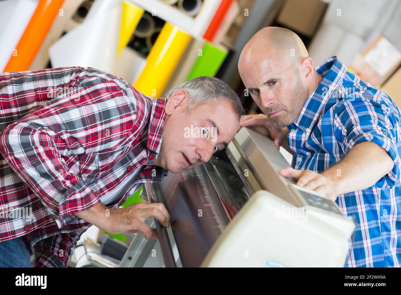 workers on offset printing machine in print factory Stock Photo - Alamy