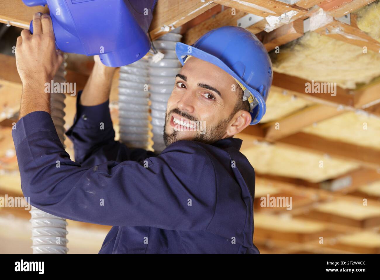 professional contractor installing air conditioning system Stock Photo ...
