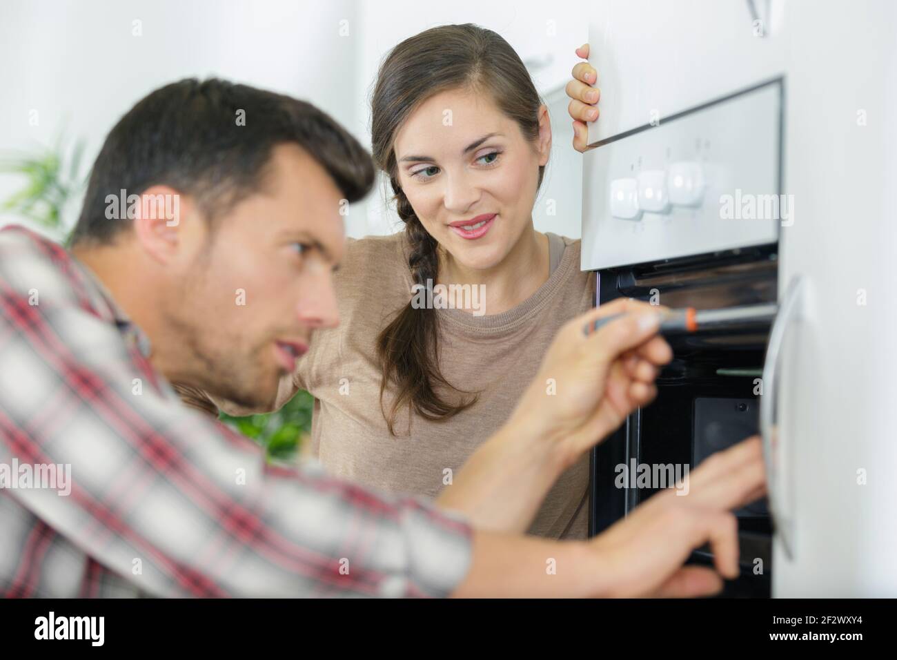 Broken oven hi-res stock photography and images - Alamy