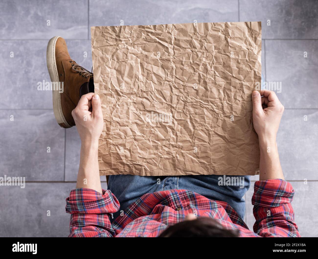 Male Hands Crumpling Paper