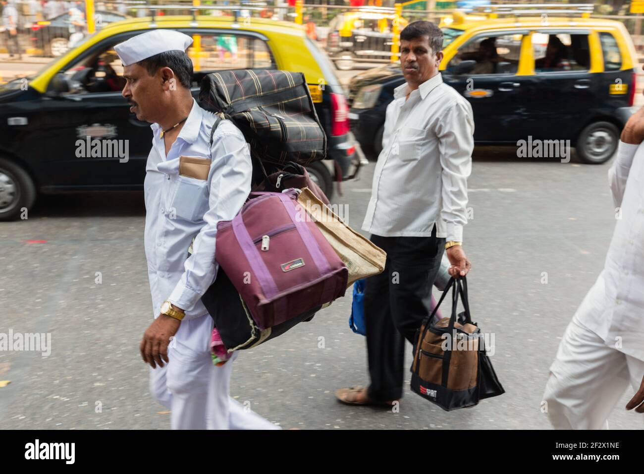 India, Mumbai - Mumbai Dabbawalas after delivering the food Stock Photo ...