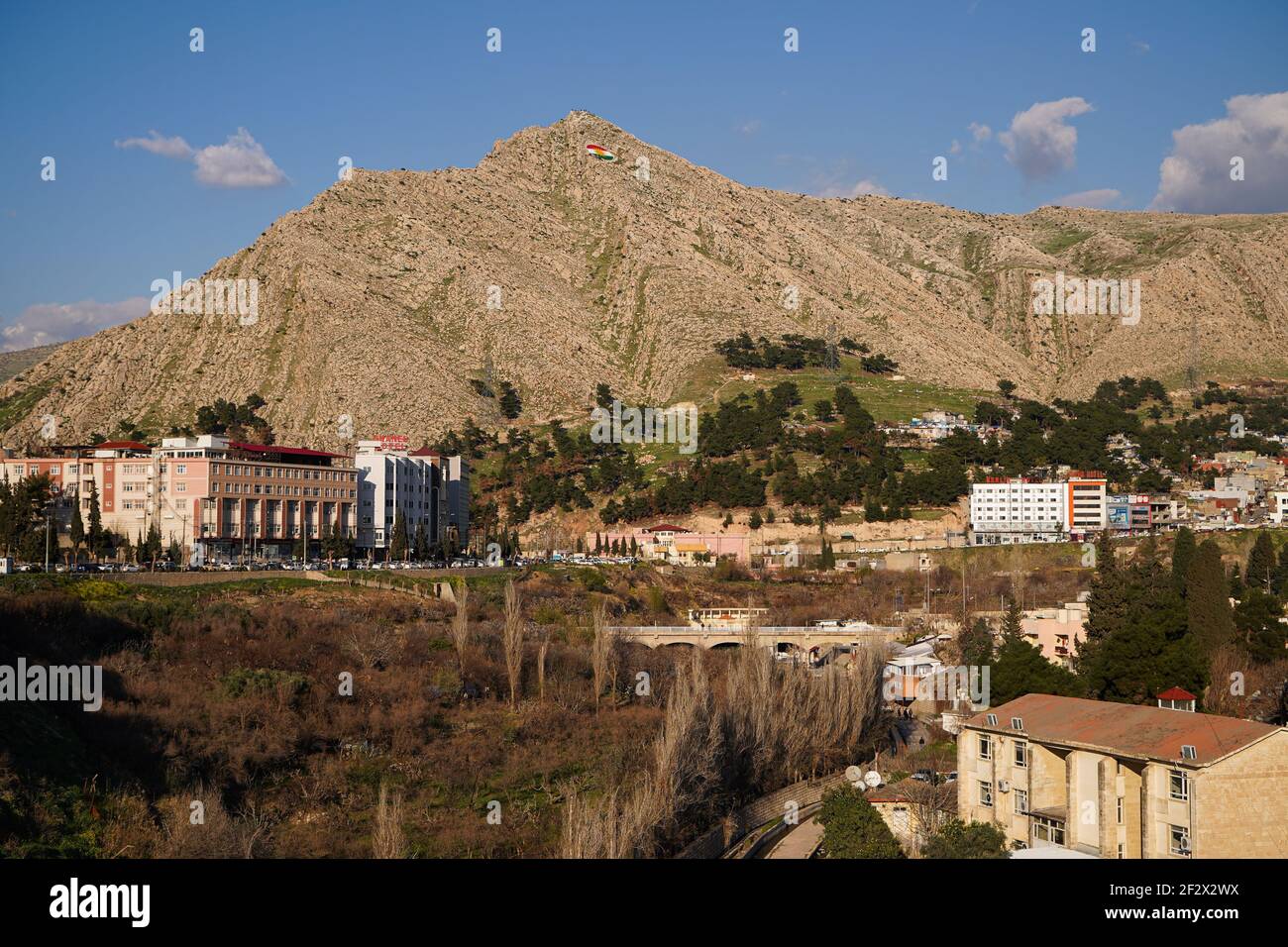 A view of the houses inside the city built on the foot of a mountain ...