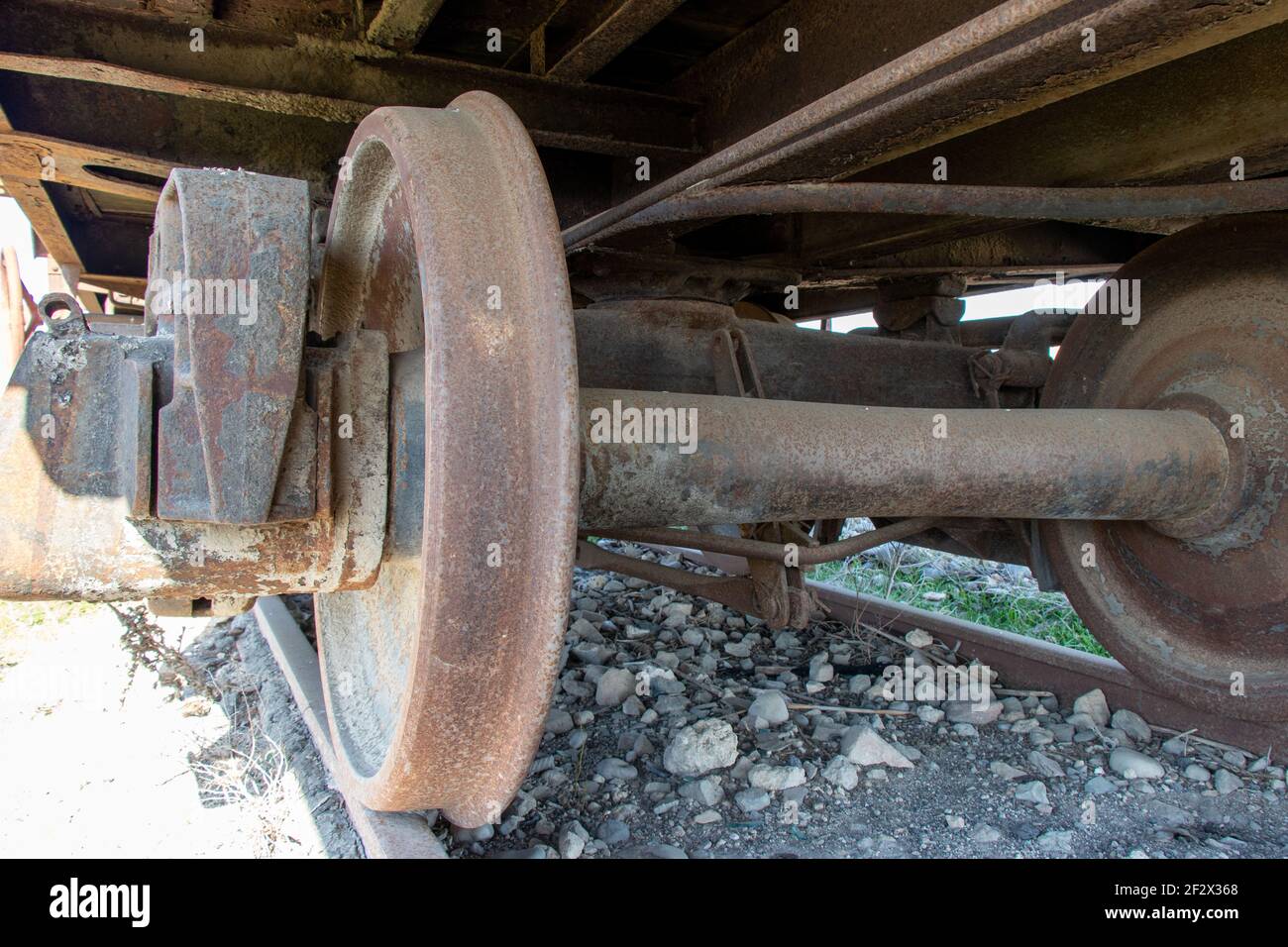 Closeup of the old rusty train wheels. Details of the wheel of train ...