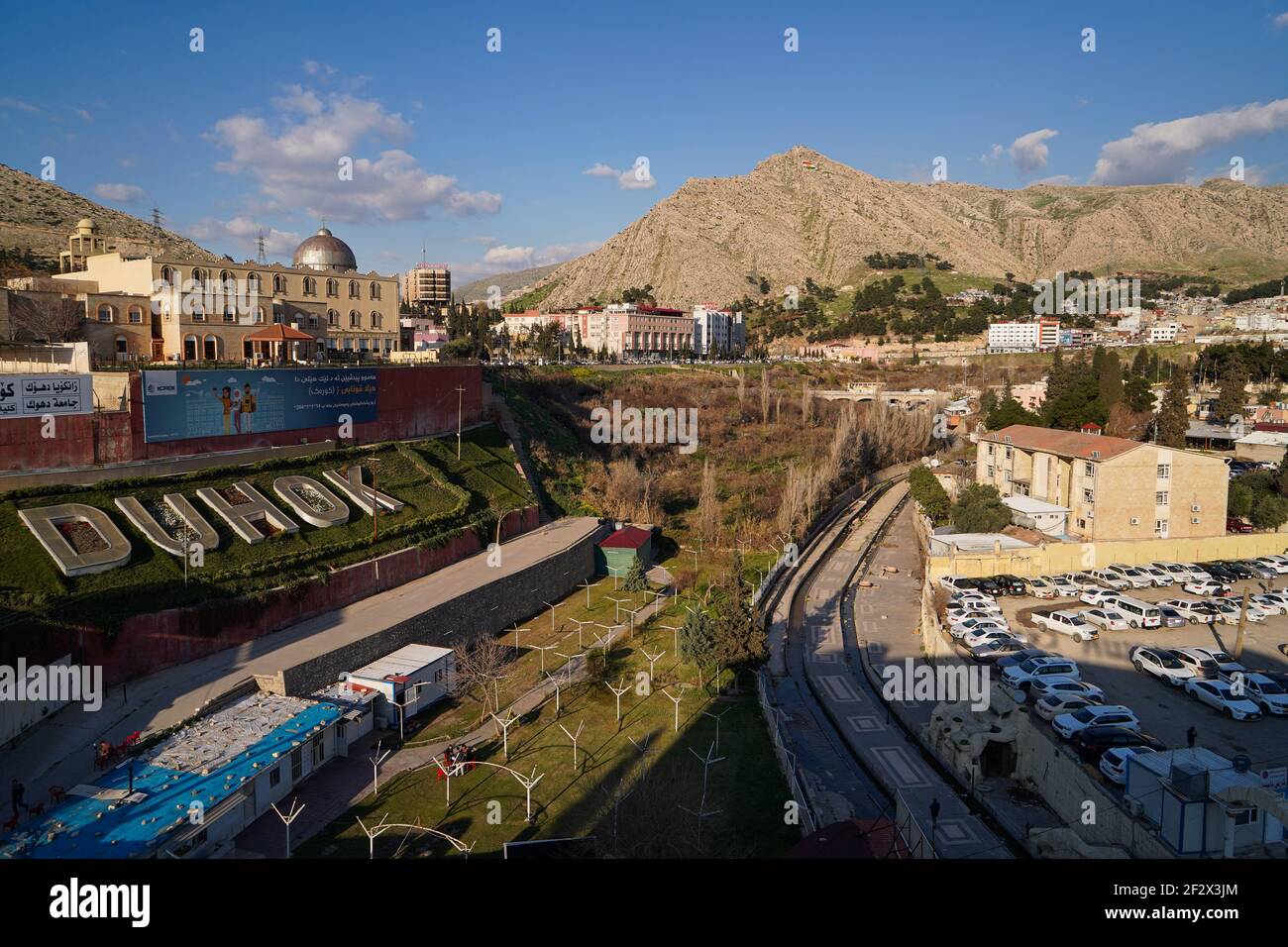 A general view of the city surrounded by a mountain.Duhok city in the ...