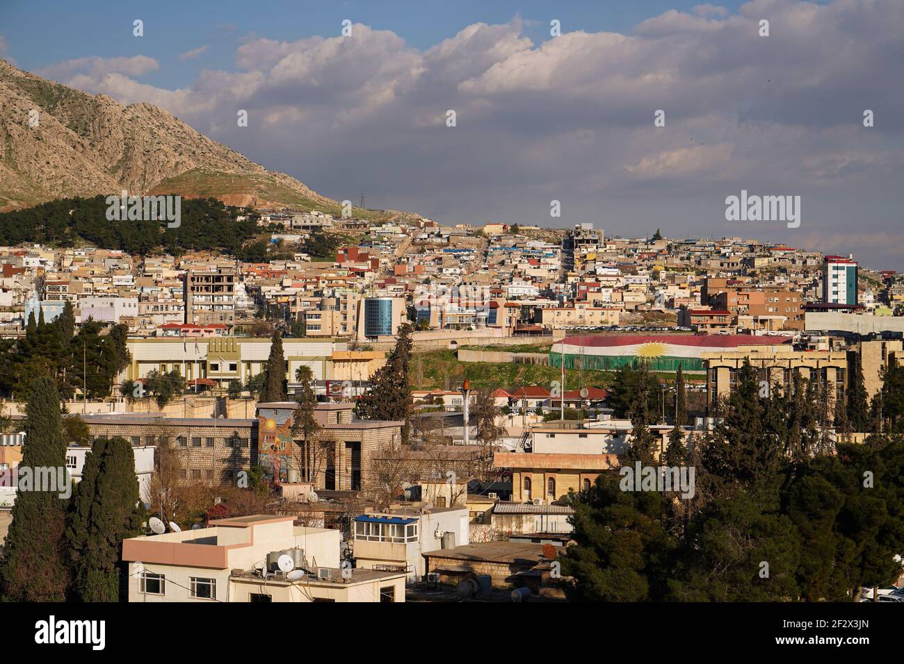 A view of the houses inside the city built on the foot of a mountain ...