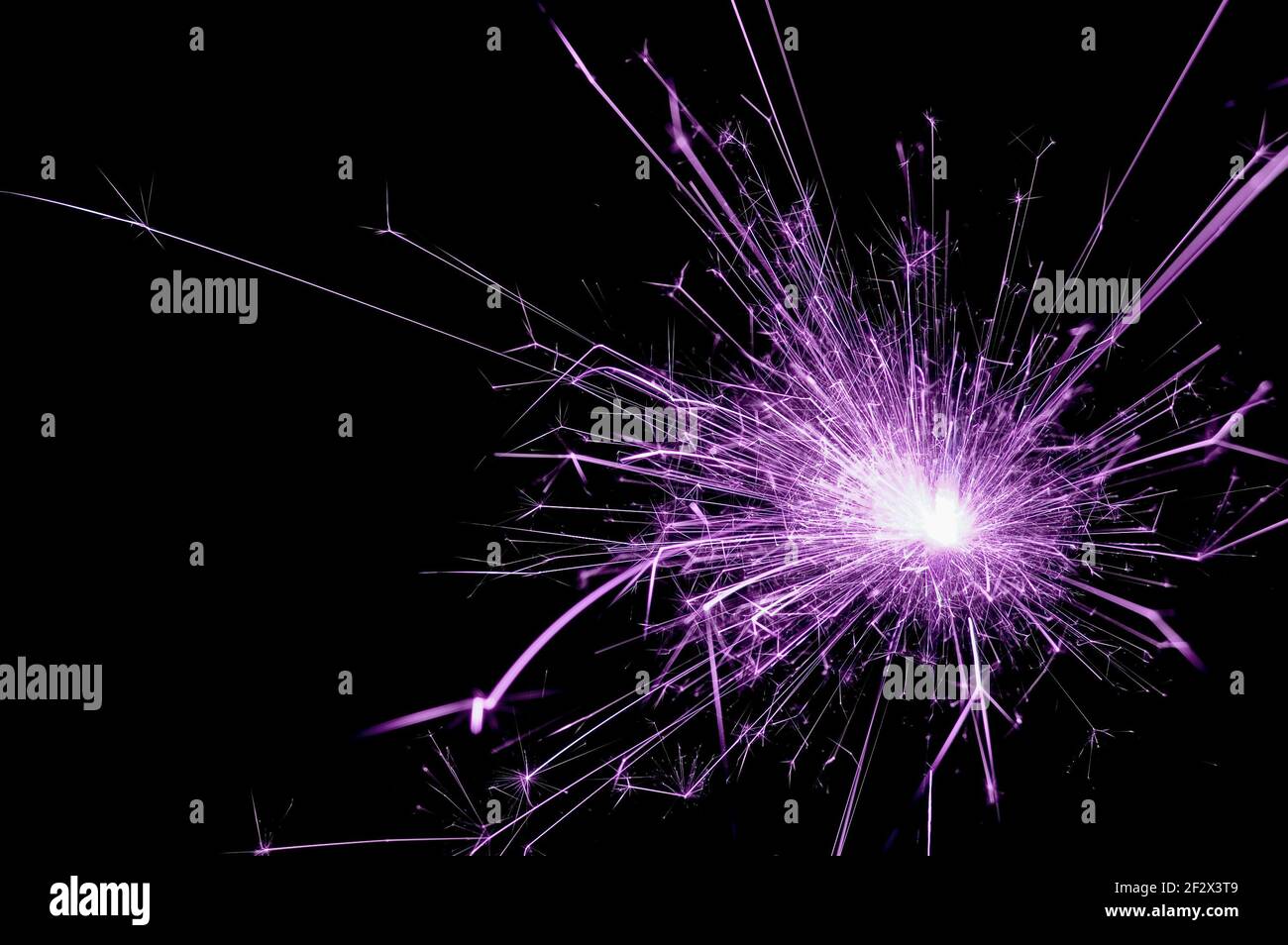 purple sparkler firework abstract Stock Photo - Alamy