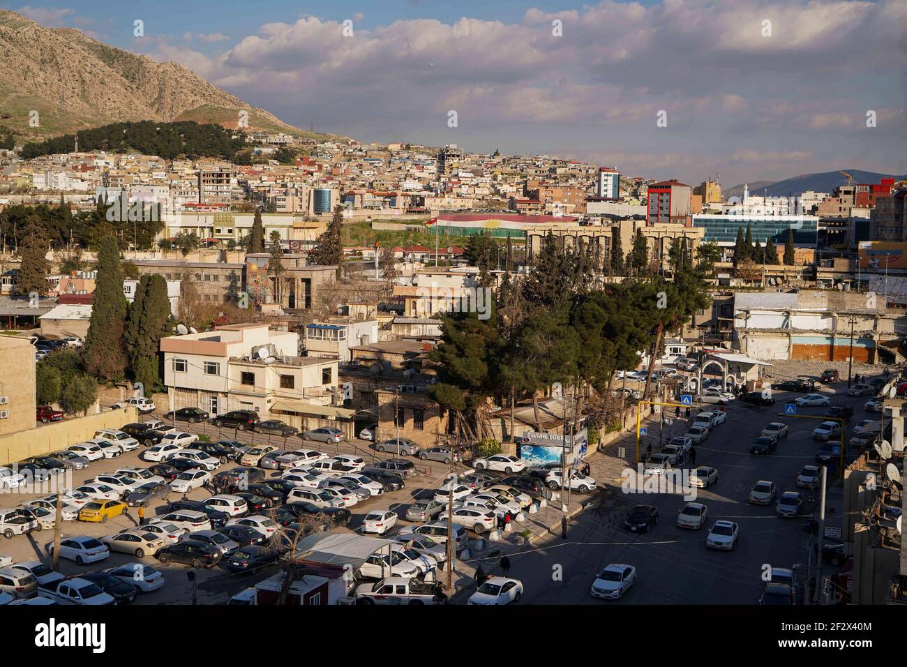 Duhok, Iraq. 13th Mar, 2021. A view of a street in the city and houses ...