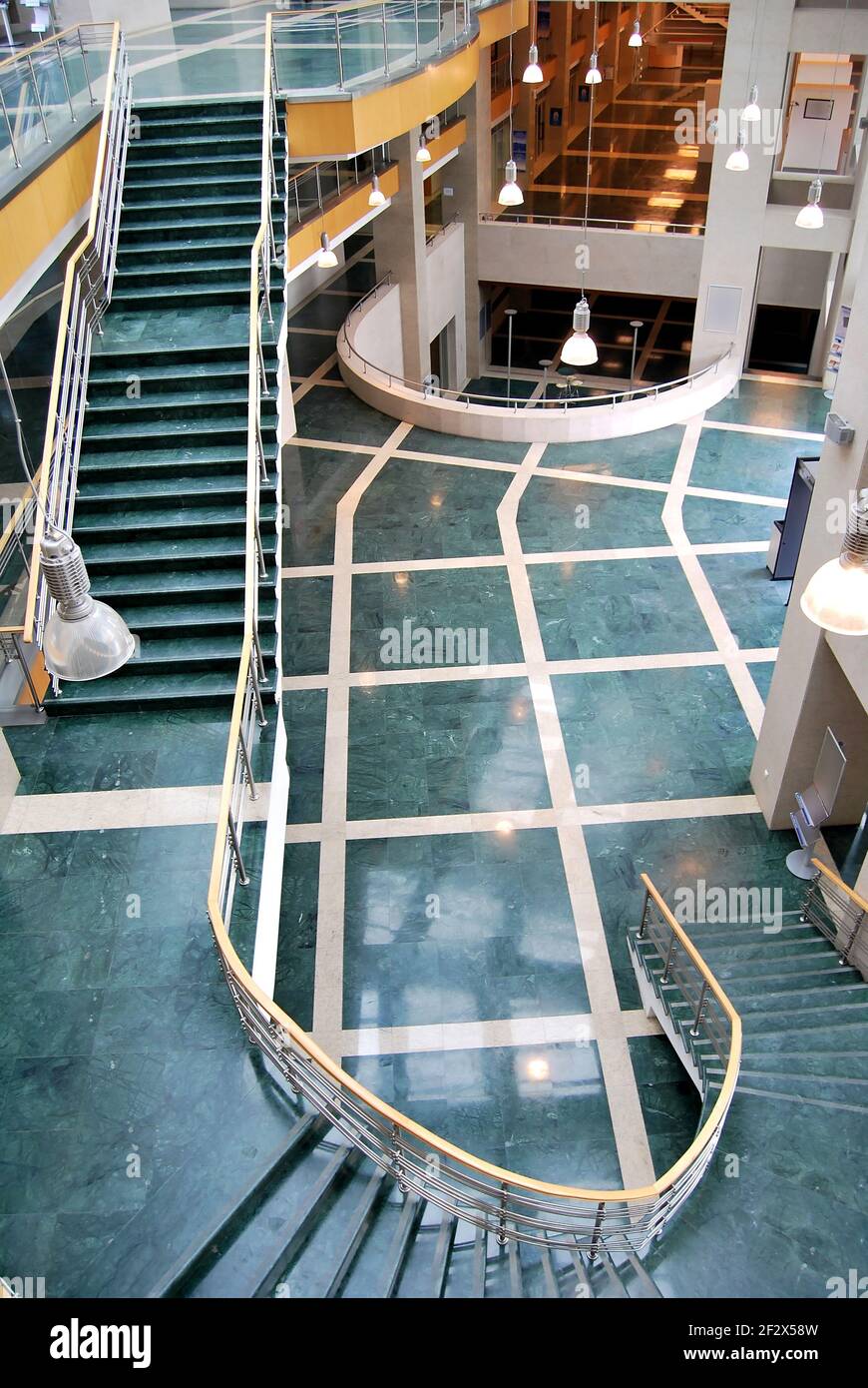 Luxury building entrance, reception and green marble staircase lobby ...