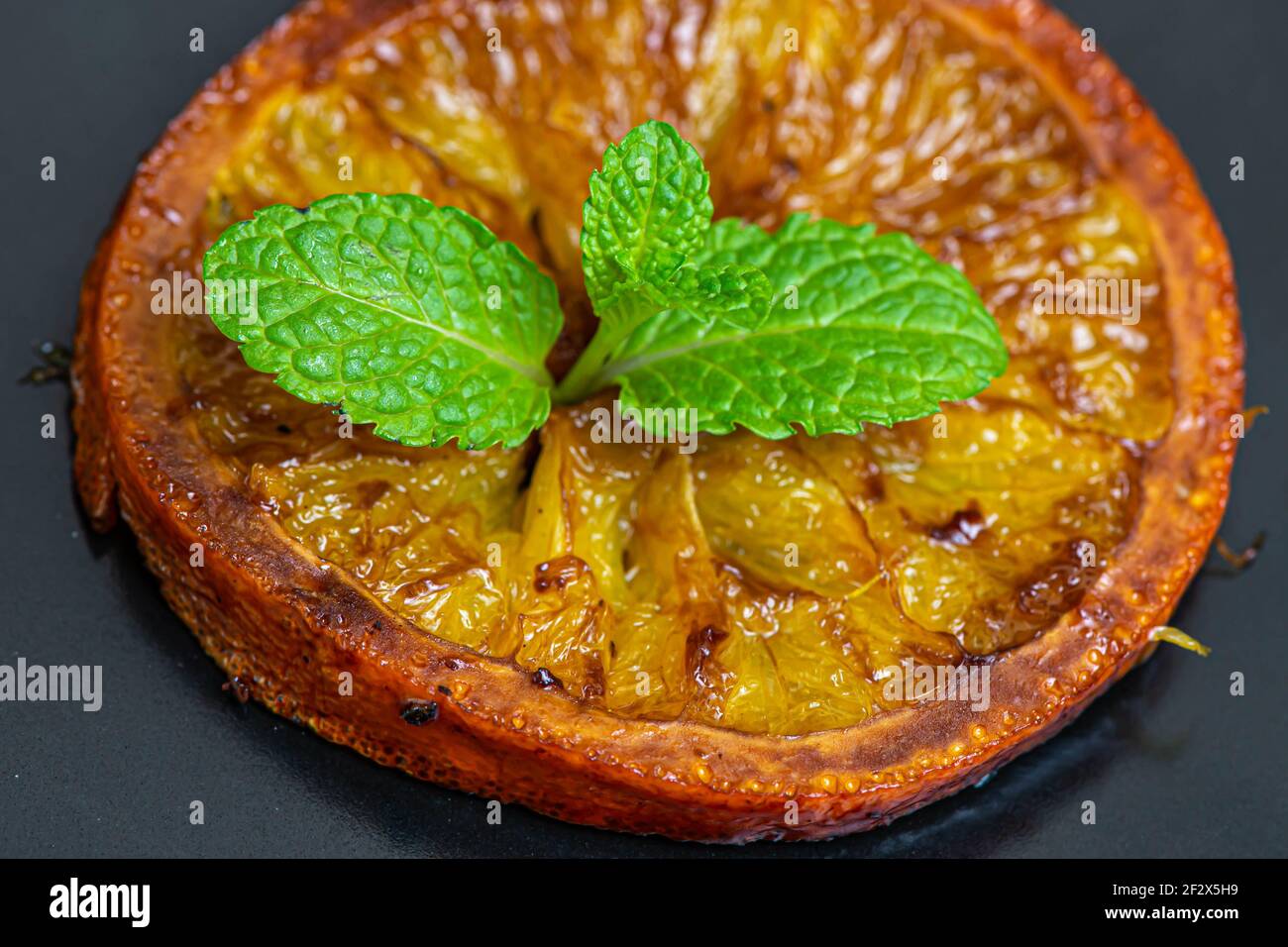 Pan seared orange fresh mint Stock Photo - Alamy