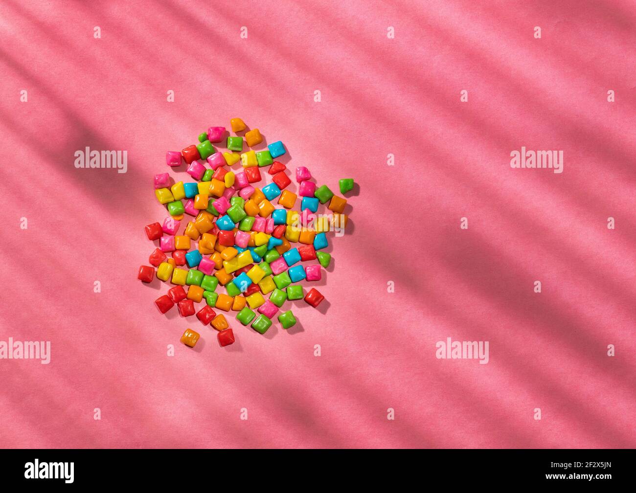Colored chewing gum in the heap - Text space Stock Photo - Alamy