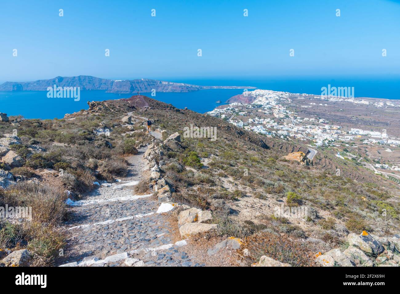 Panorama view of Oia from caldera hiking trail, Santorini, Greece Stock ...