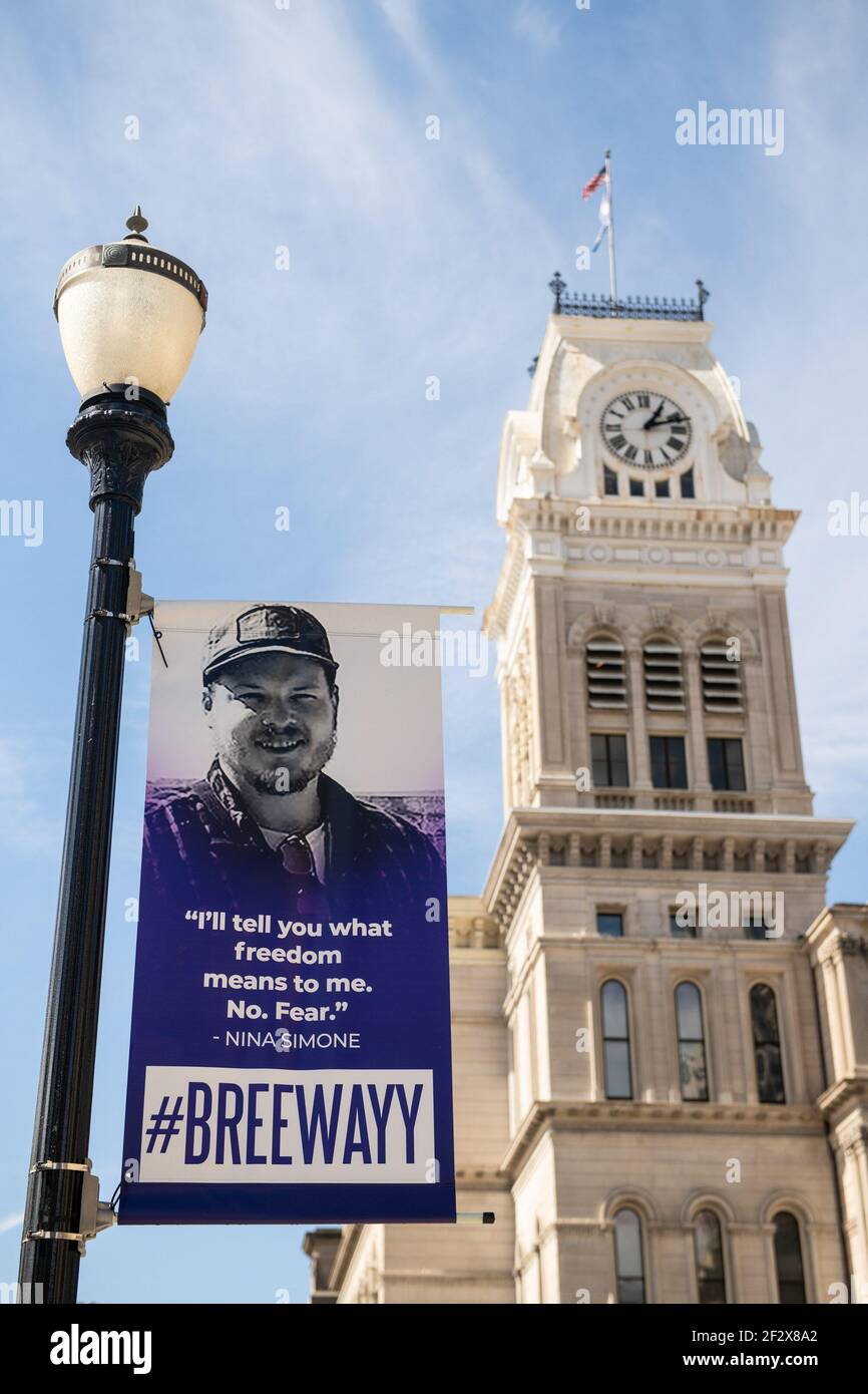 A sign picturing Tyler Gerth, a local photographer who was killed ...