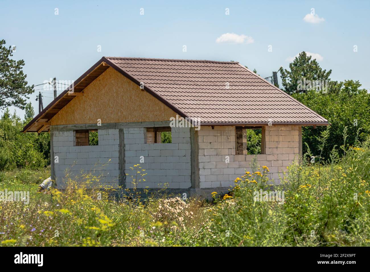 New construction, unfinished small house in a rural area Stock Photo ...