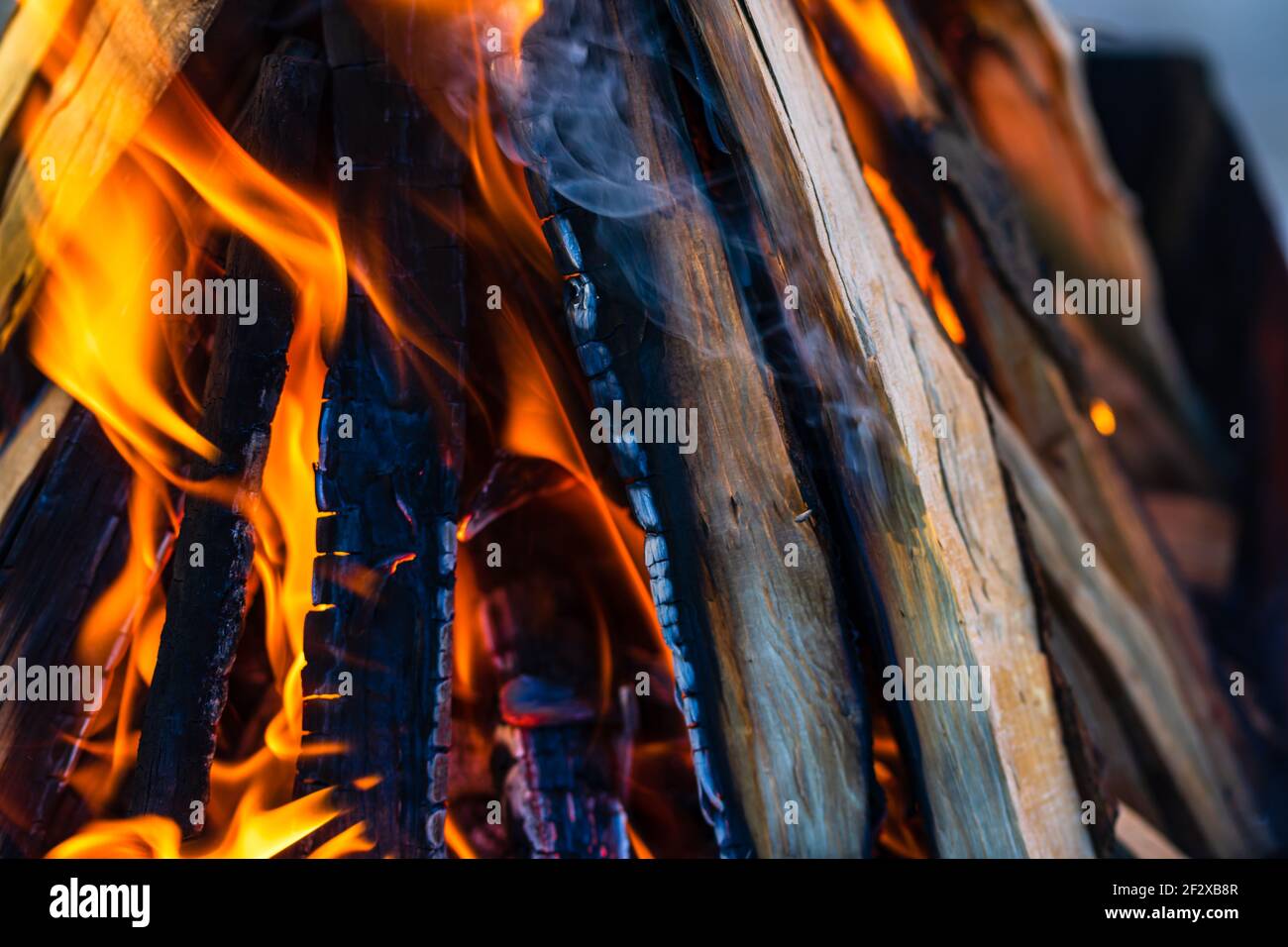 Burning wood chips to form coal. Barbecue preparation, fire before ...