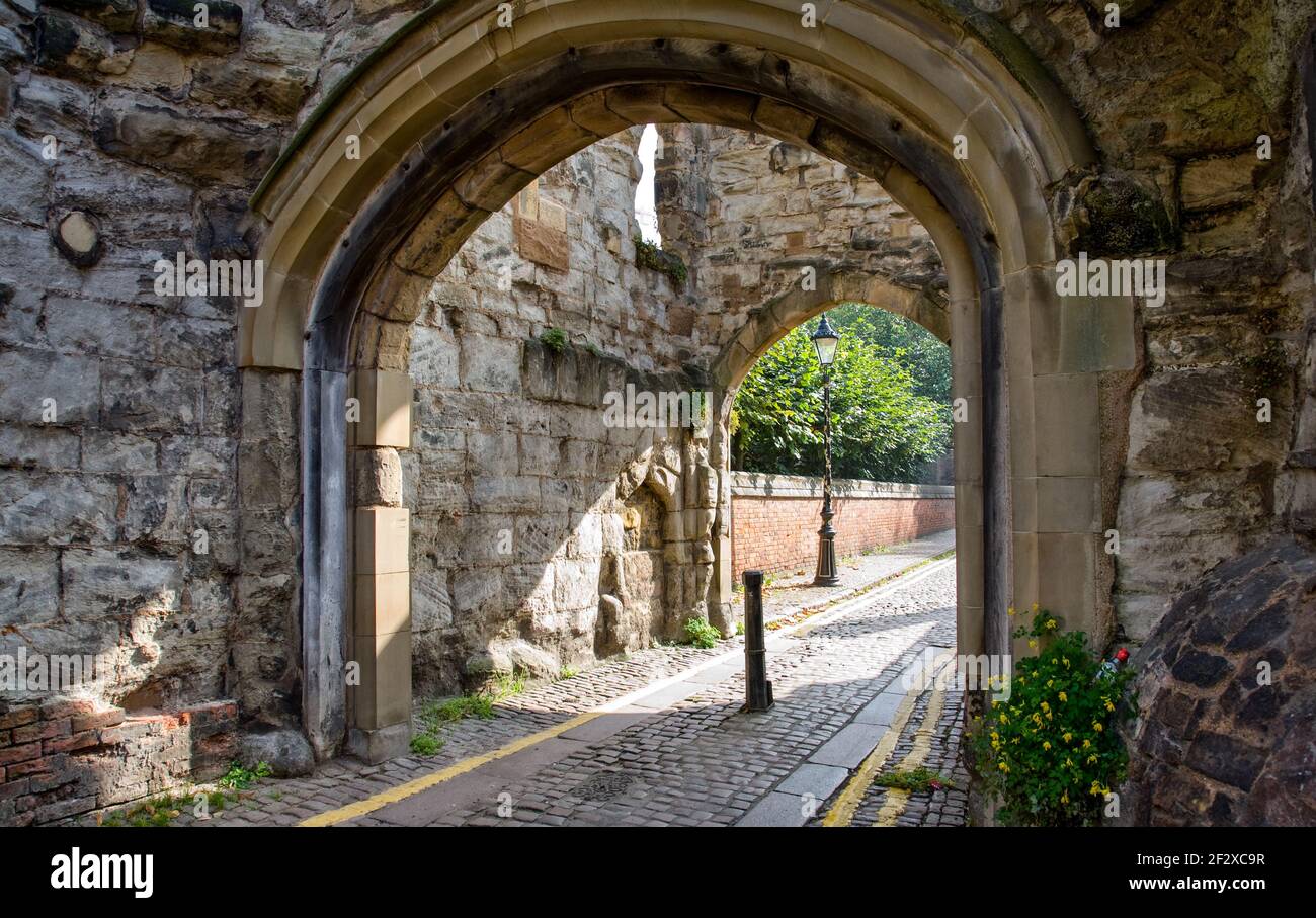 medieval cobblestone path and and gatehouse Stock Photo - Alamy