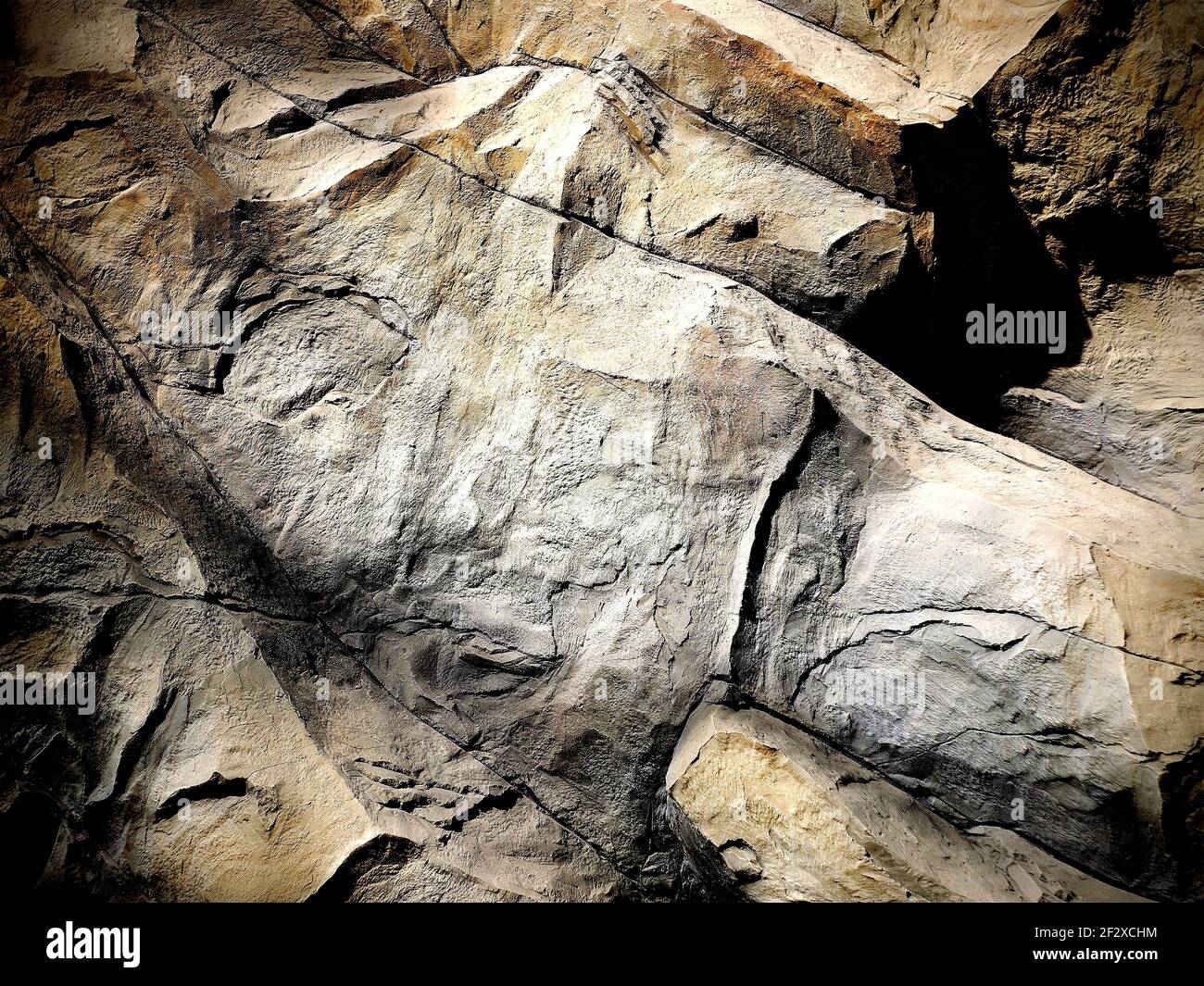 Decorative rock background in grey and yellow Stock Photo - Alamy