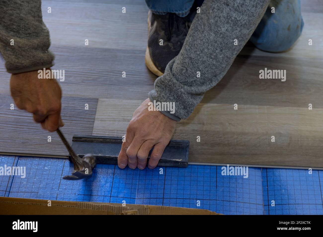 Renovation works craftsman improvement man with a using hammer the ...