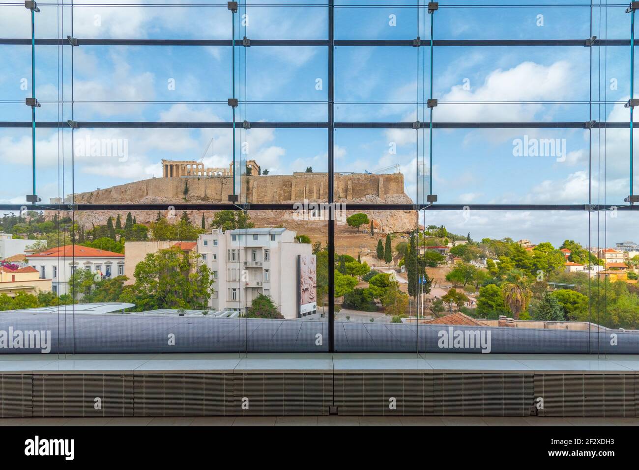 Acropolis palace viewed from the Acropolis museum in Athens, Greece ...