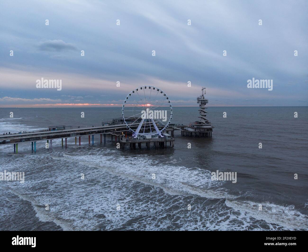 Aerial panorama view of amusement park attractions on beach pier of ...