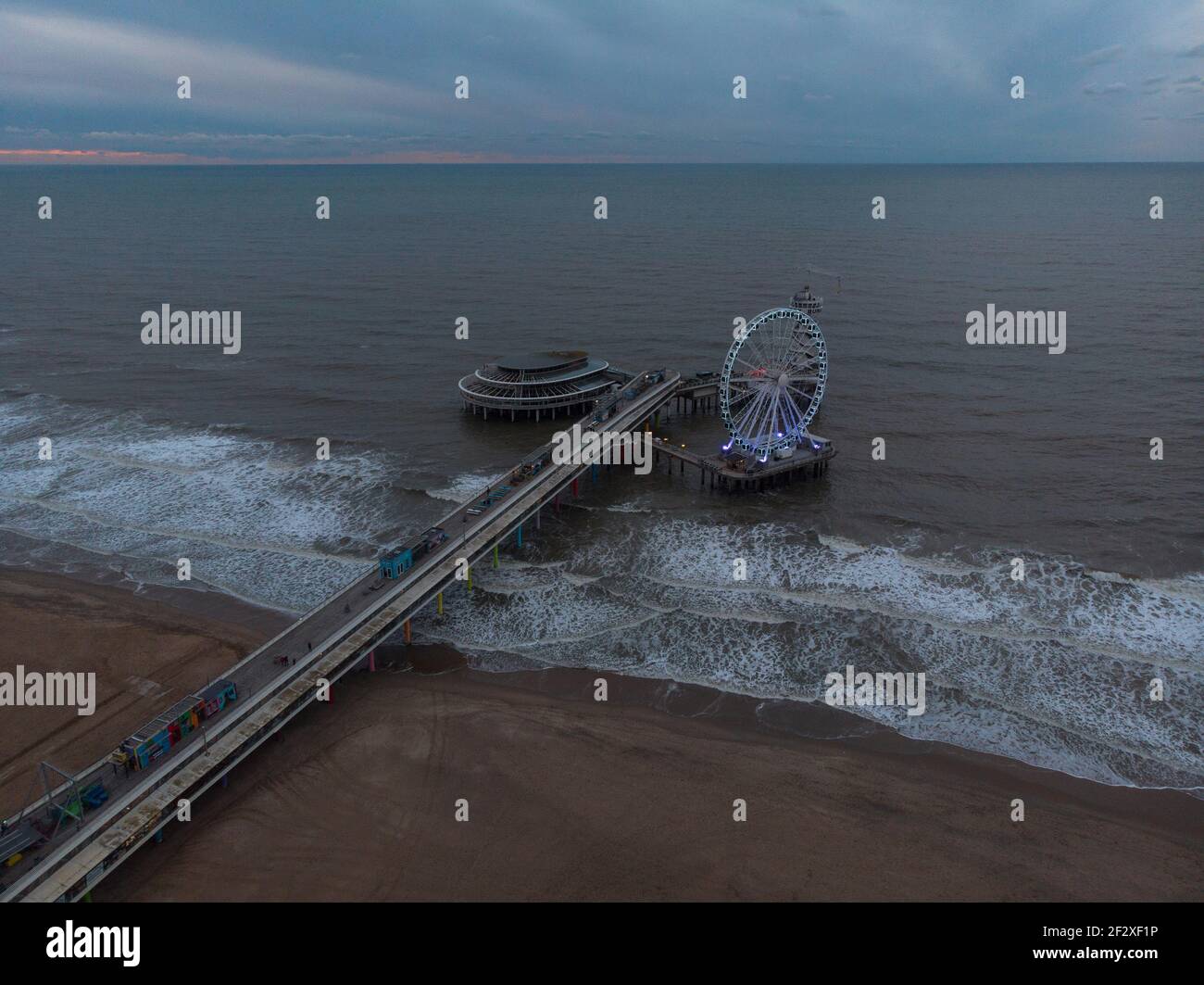Aerial panorama view of amusement park attractions on beach pier of ...