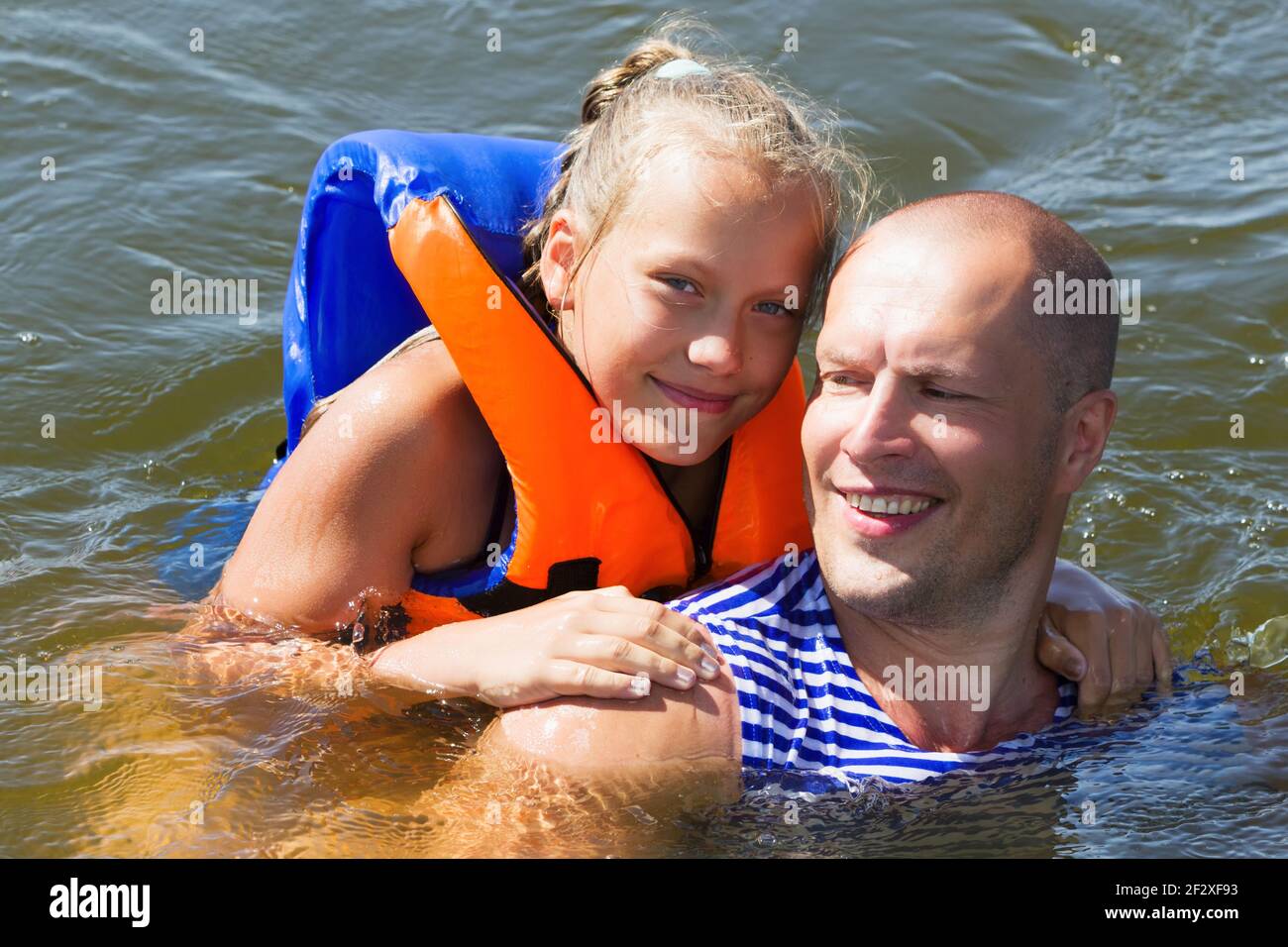Kid at lake life jacket hi-res stock photography and images - Alamy