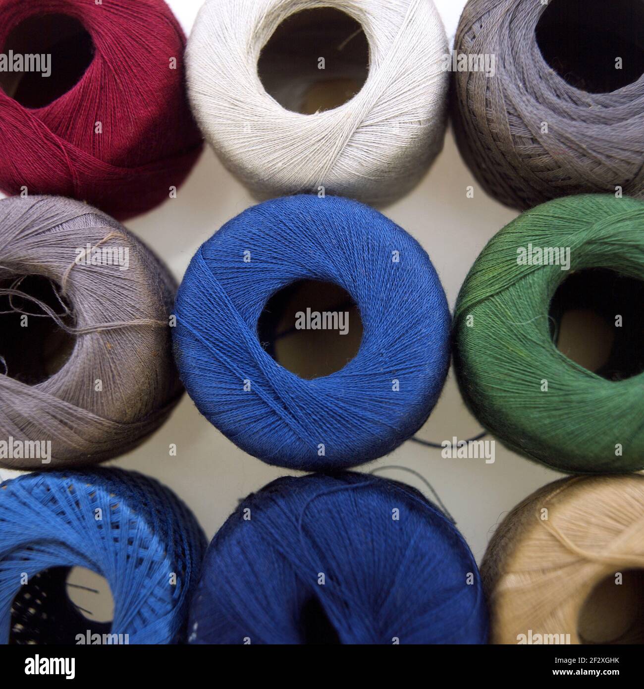 A closeup shot of rolls of colorful threads Stock Photo - Alamy
