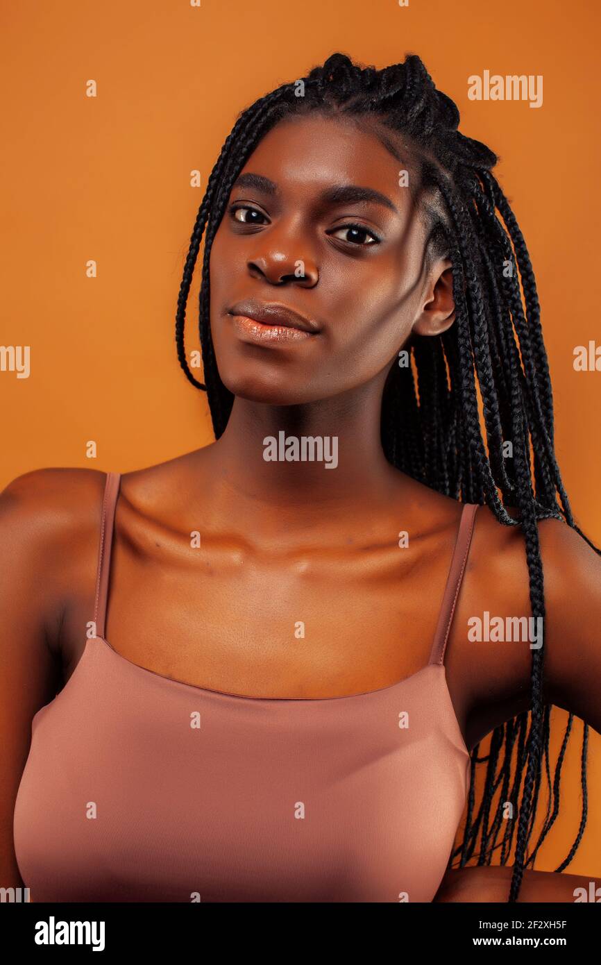 pretty young african american woman with braids posing cheerful ...