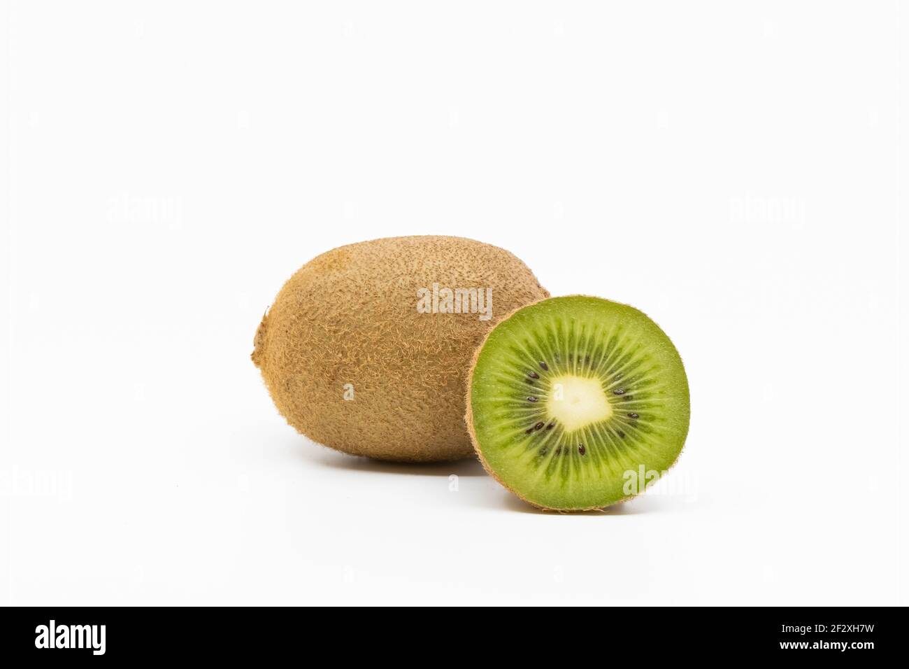 Kiwi Fruits Isolated on White Background, Whole kiwi fruit and half ... Kiwi Fruits Isolated on White Background, Whole kiwi fruit and half ...