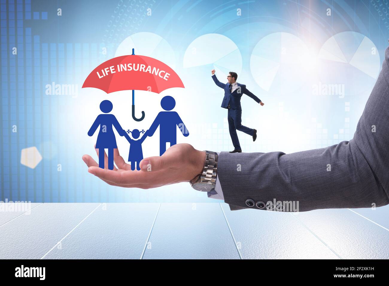 Life insurance concept with family under the umbrella Stock Photo - Alamy