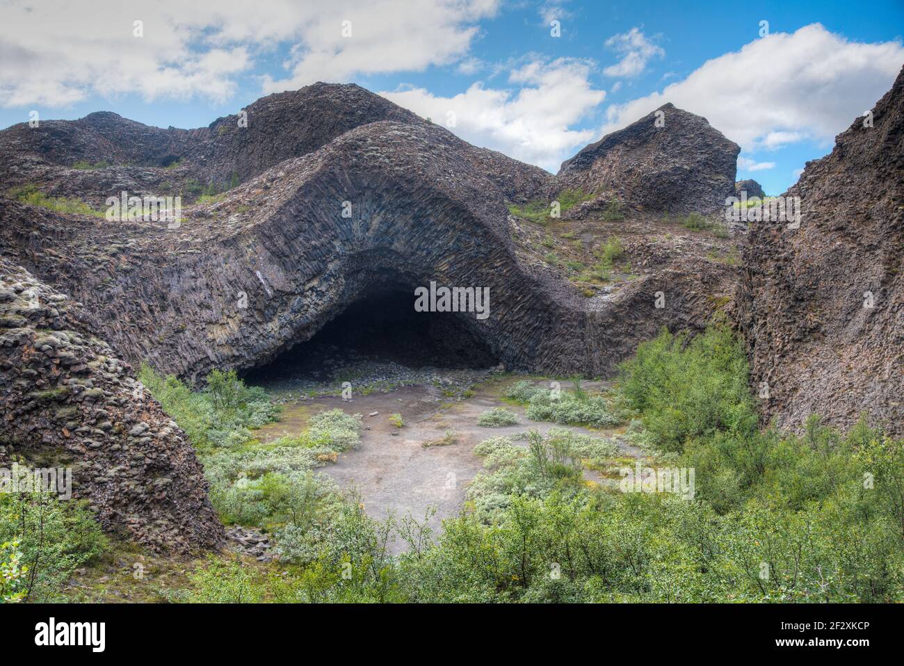 Hexagonal basalt rocks formed Kirkja cave at Hljodaklettar on Iceland ...
