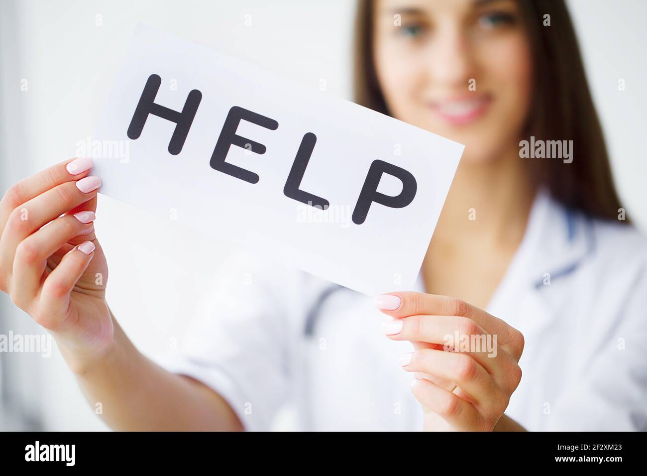Health Care. Doctor Holding a Card With Symbol SOS, Medical Concept ...