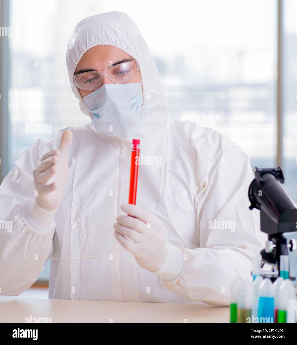 The man doctor checking blood samples in lab Stock Photo - Alamy