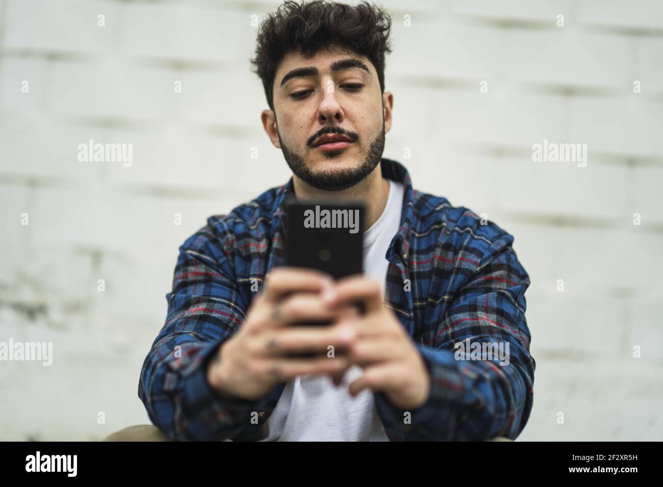 Young spanish man cool hat hi-res stock photography and images - Alamy