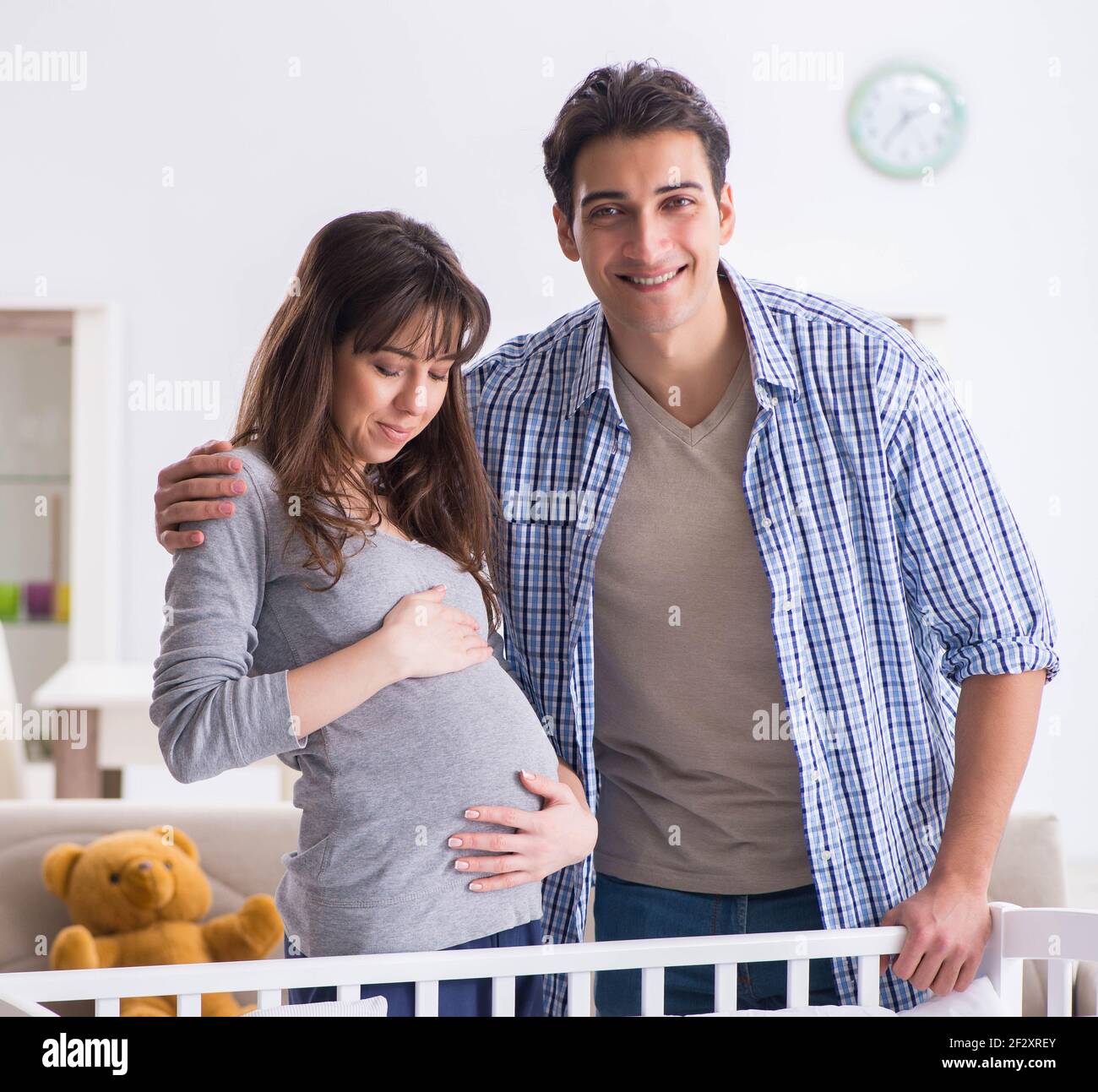The young parents expecting their first baby Stock Photo - Alamy