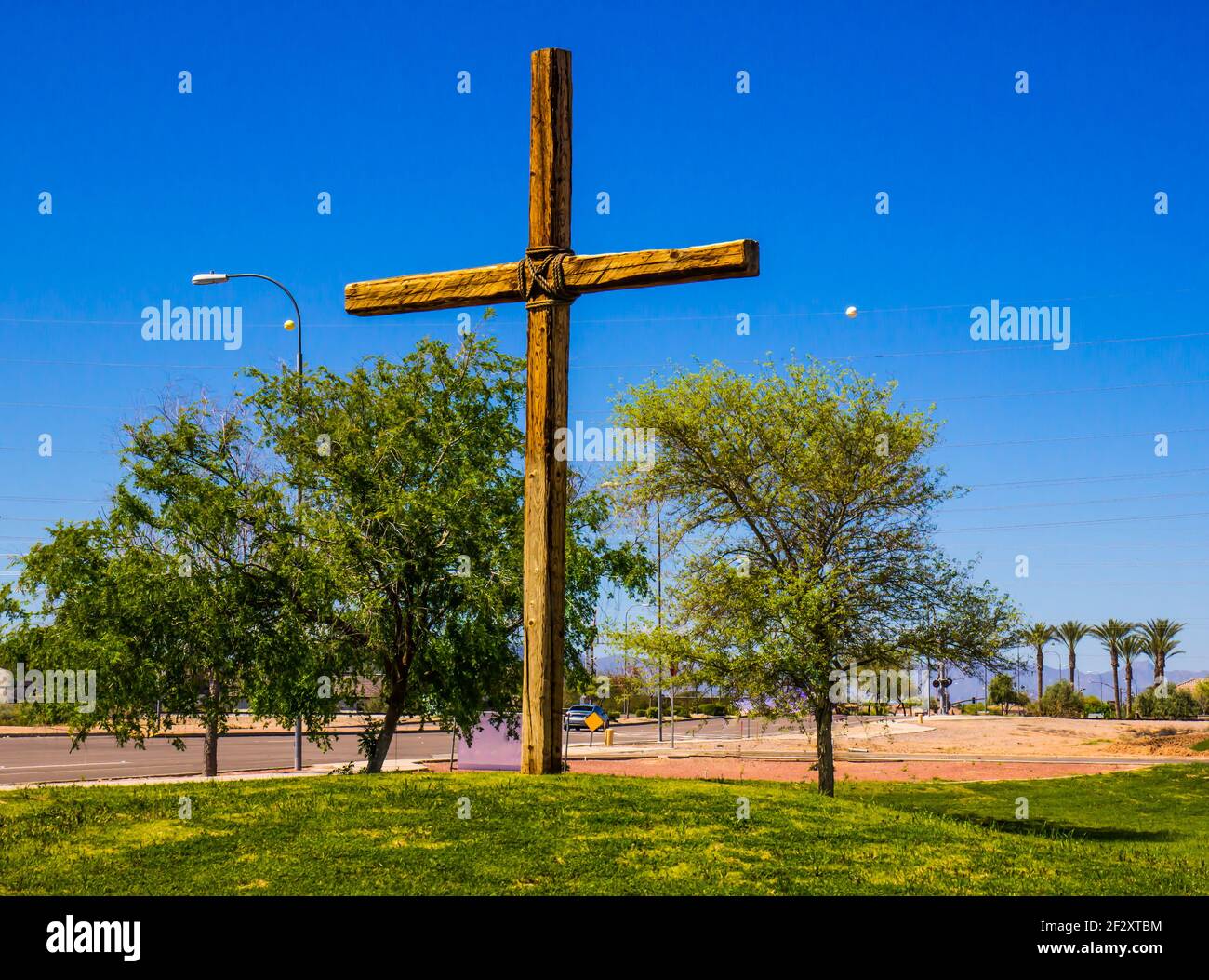 Weathered Wooden Cross On Grass Knoll Stock Photo - Alamy