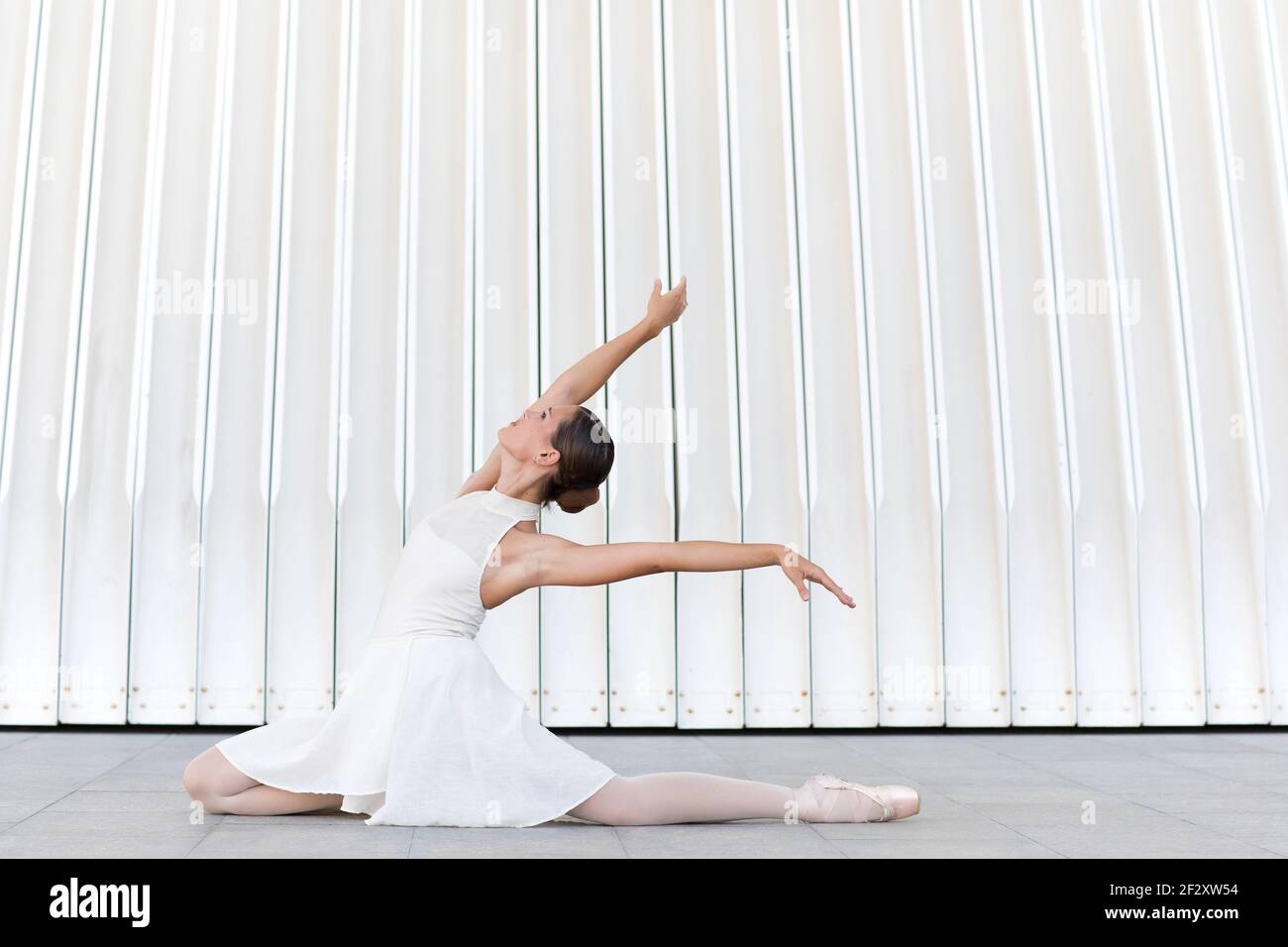 Ballet dancer performing on pavement hi-res stock photography and ...