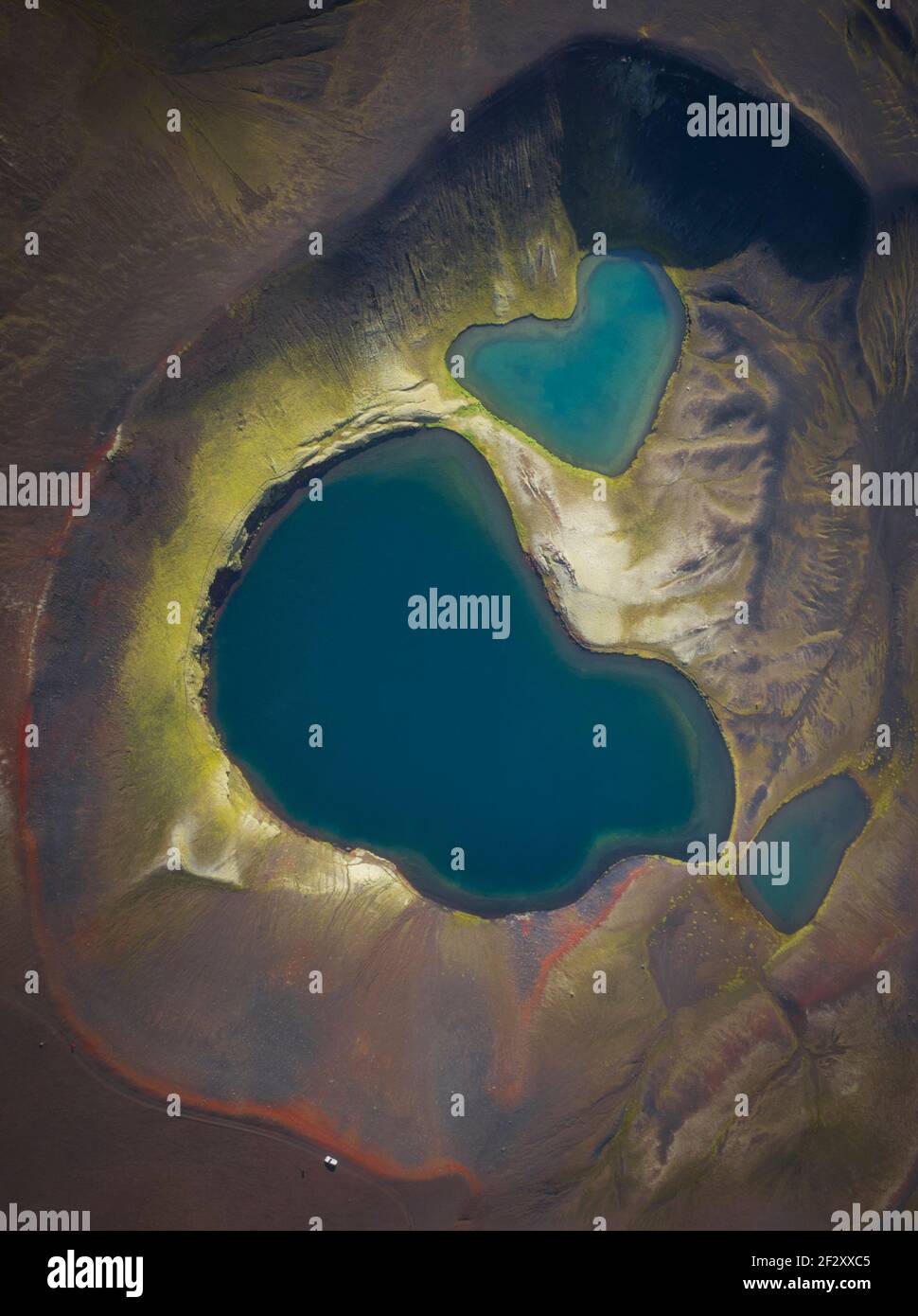 Wonderful scenery of crystal clear lake on vulcan crater surrounded by ...