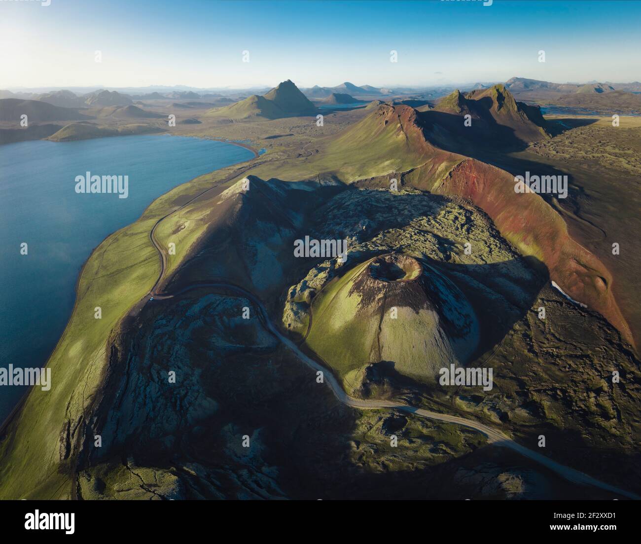Wonderful scenery of crystal clear lake on vulcan crater surrounded by ...