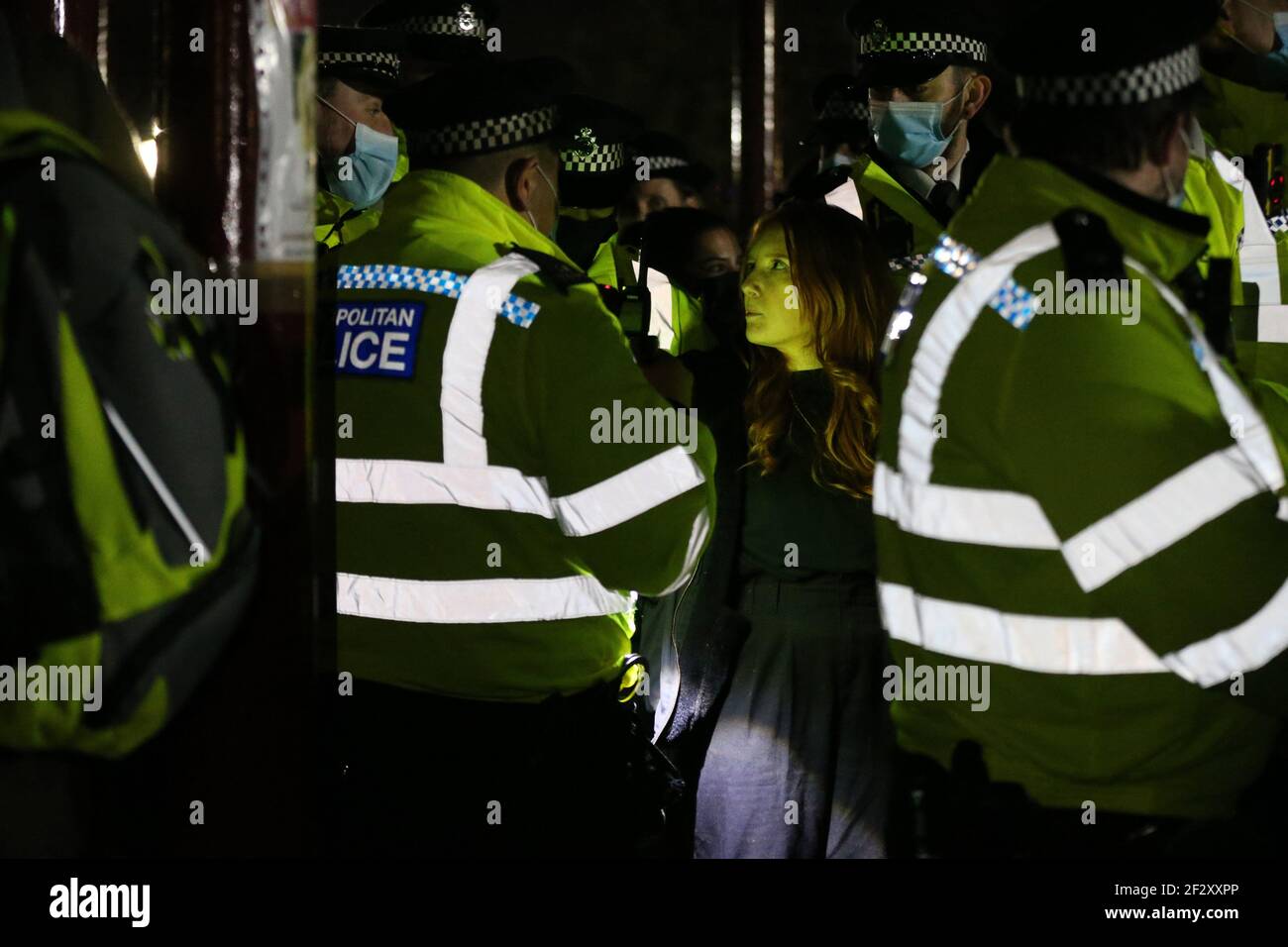 London, England, UK. 13th Mar, 2021. Police arrest a woman ...