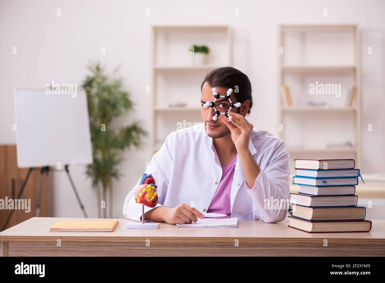 Young doctor student sitting in the classroom Stock Photo - Alamy
