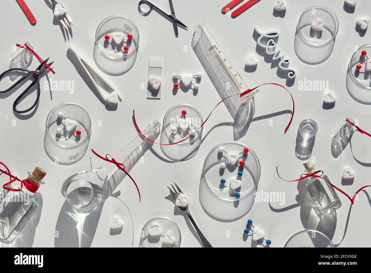 Chemistry of love. Creative flat lay, top view with chemical glassware ...