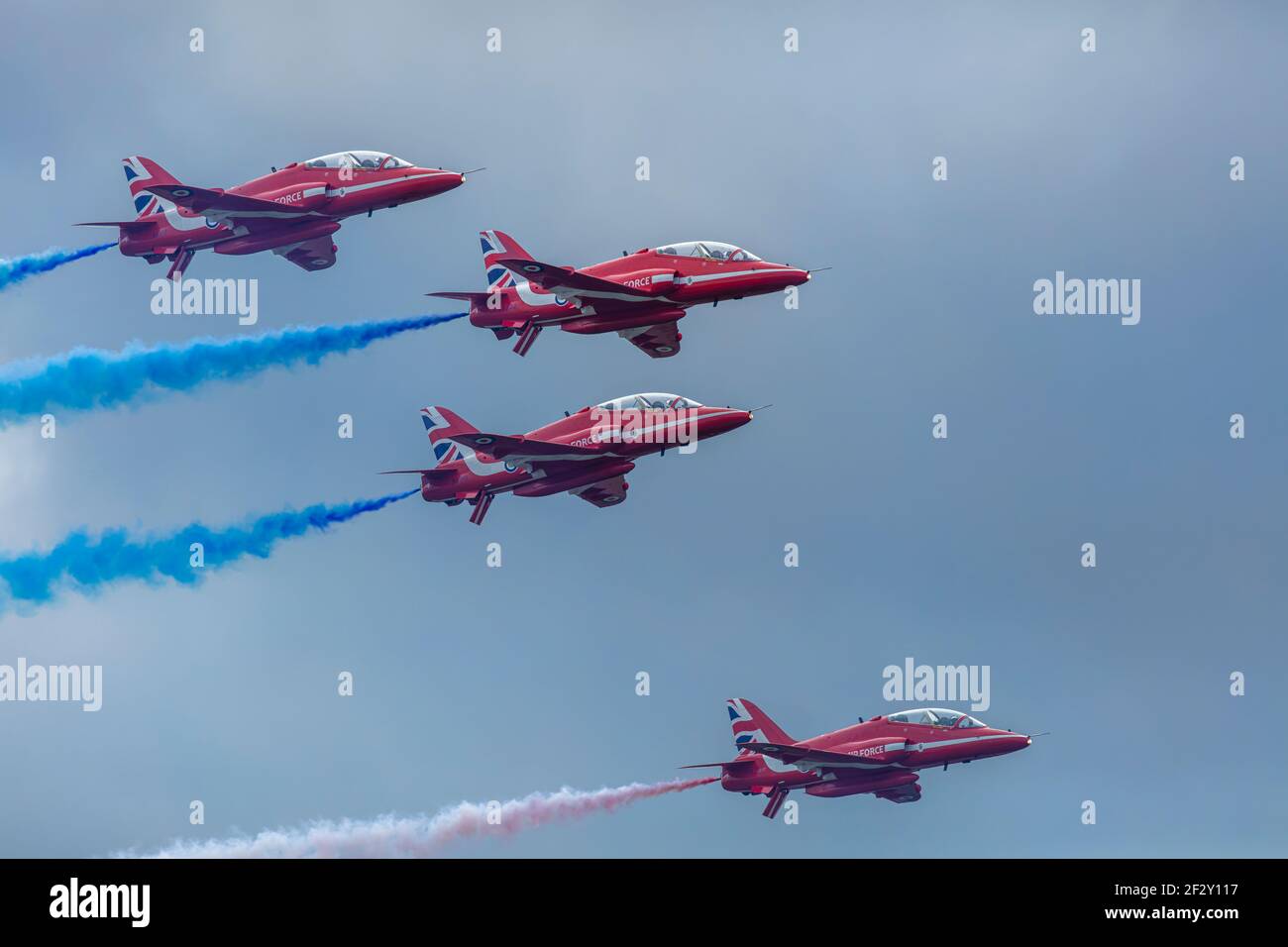 Four RAF Red Arrows Hawk Jets in Flight Stock Photo - Alamy