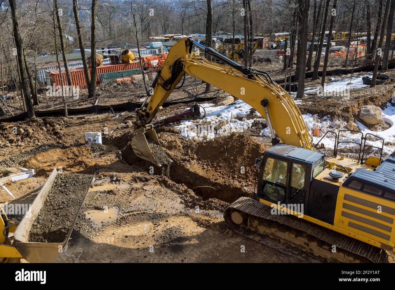 Construction of drain system with trench under construction road Stock ...
