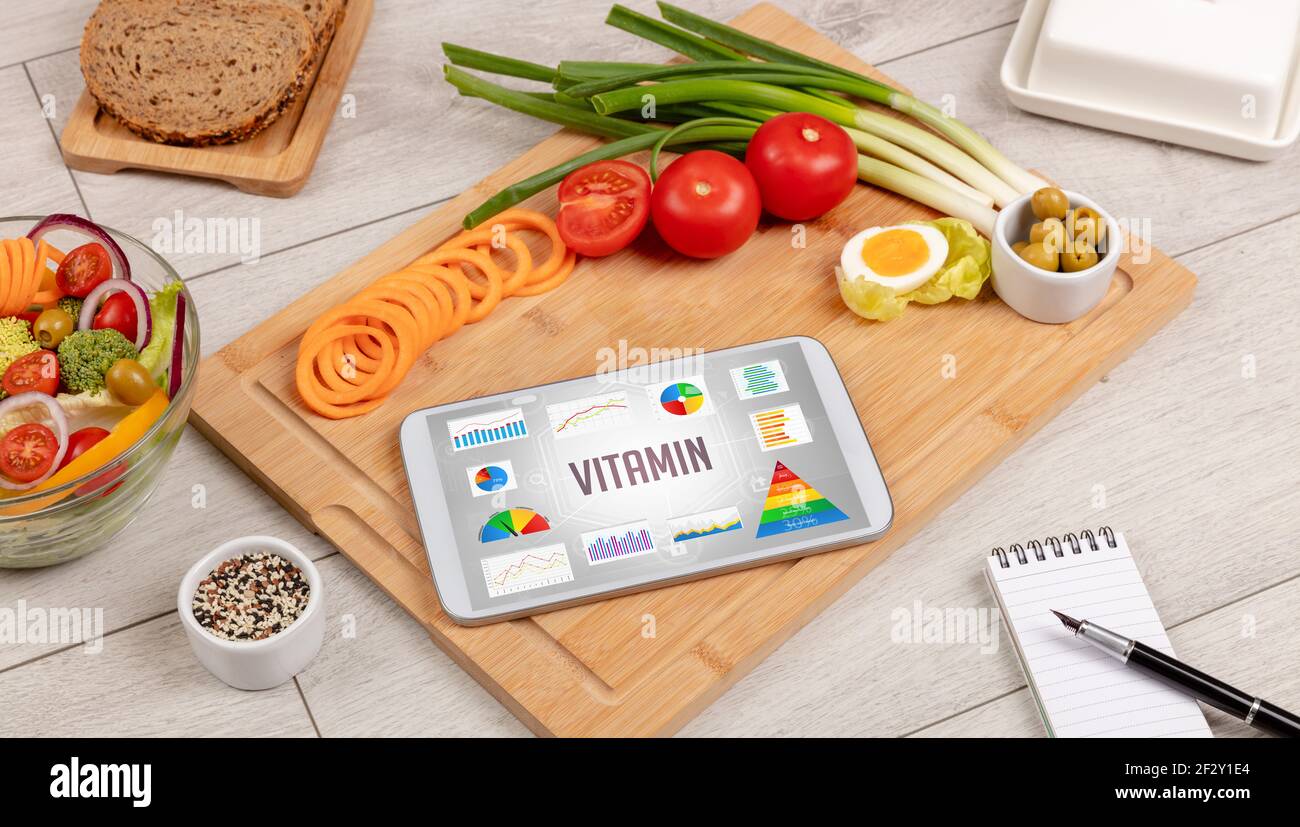 Organic food and tablet pc Stock Photo - Alamy